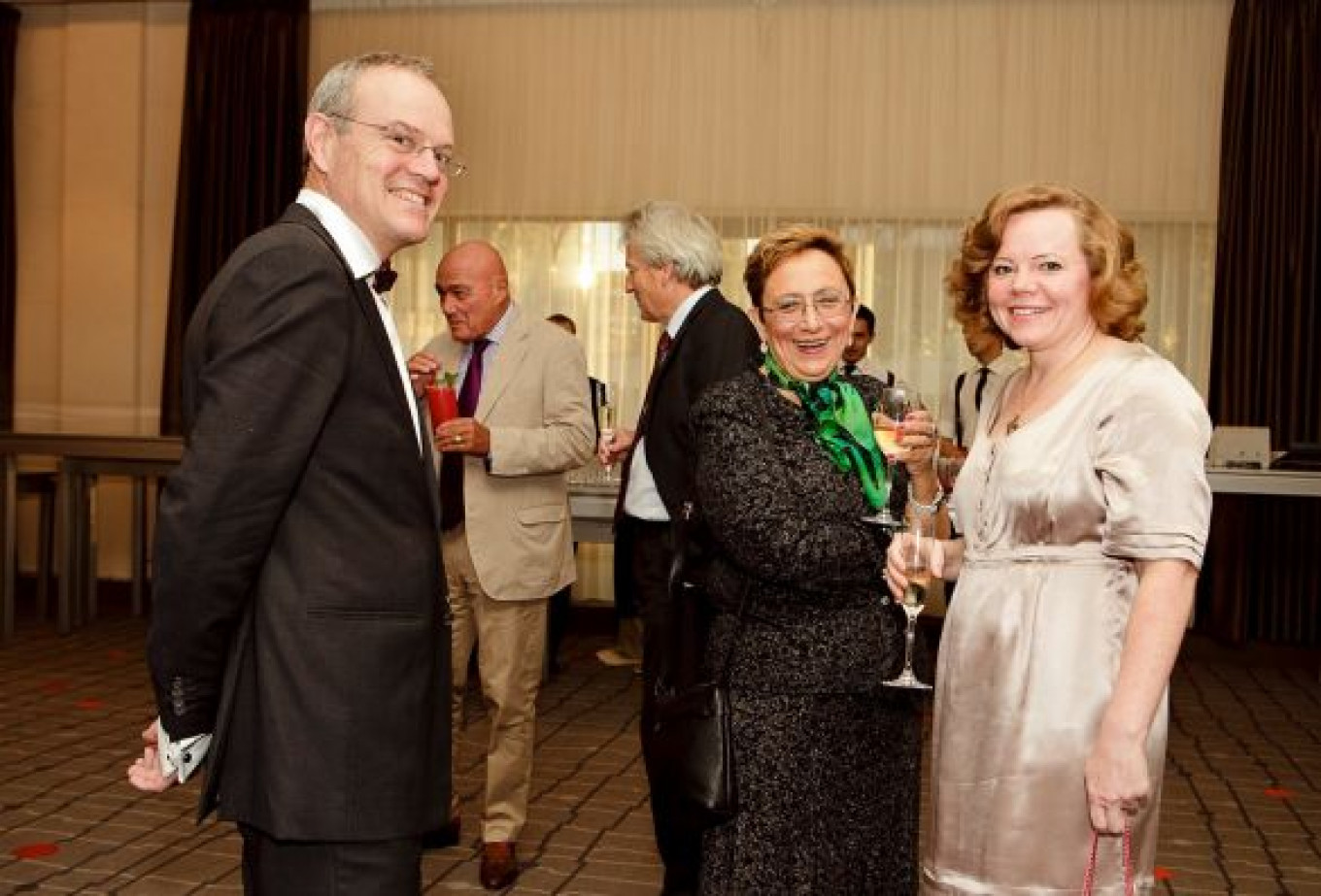 Red Ribbon Ball Fetes 10 Years, Sees Work Ahead