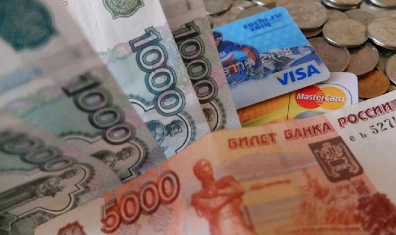 Russians Burdened by Less Debt Compared With U.S.