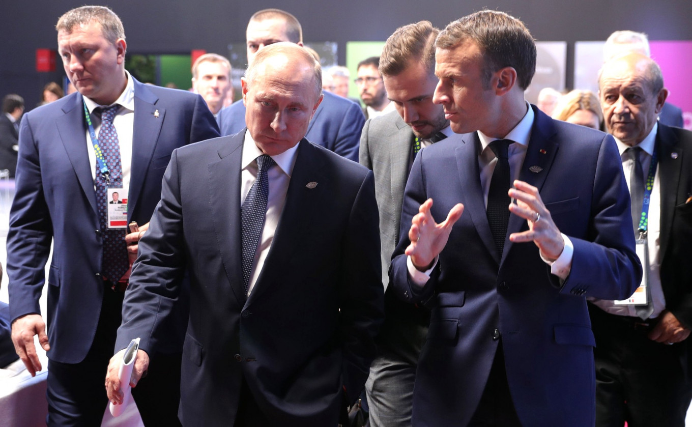 Putin-Macron Held Talks Before Russian Bank's French Executive Released ...