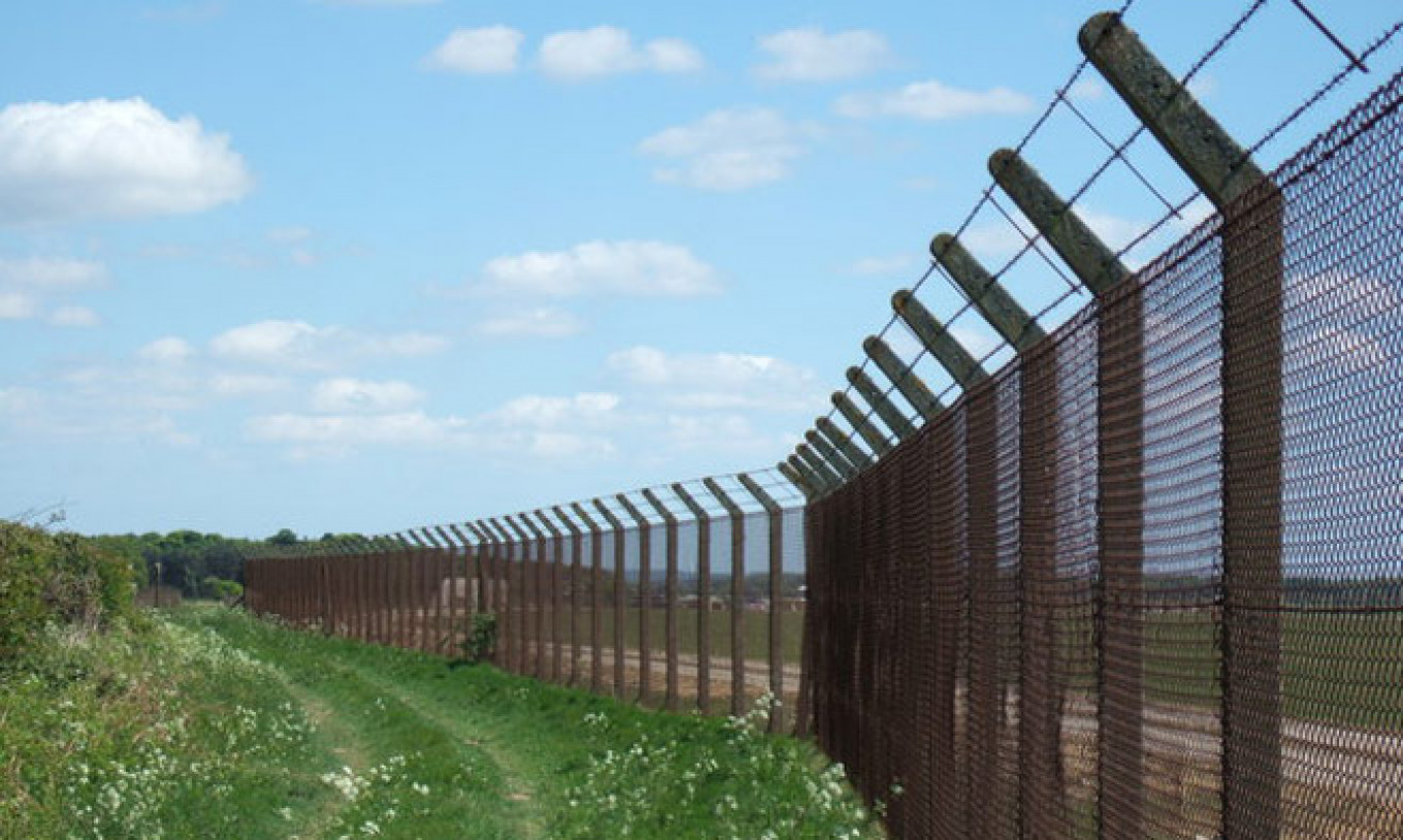 Latvia to Build 90-Kilometer Fence on Border With Russia