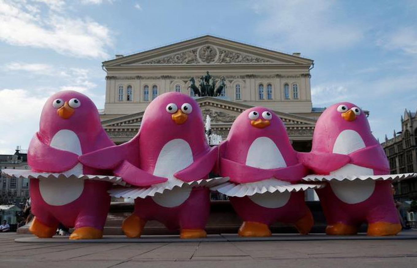 Sinister Acid-Pink Penguins Invade Moscow's Street