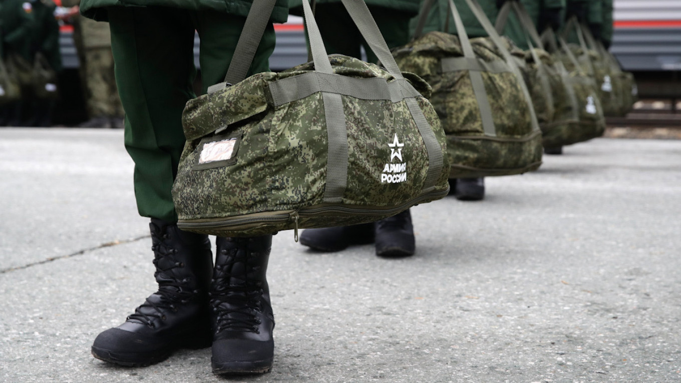 3 Dead in Axe and Gun Attack at Russian Military Base - The Moscow Times