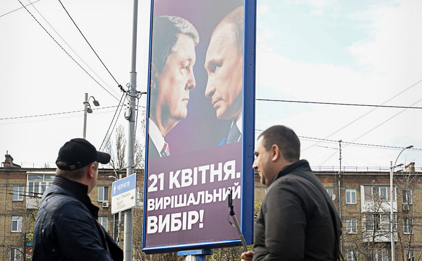 Kremlin Comments on Poroshenko vs. Putin Campaign Posters in Ukraine ...
