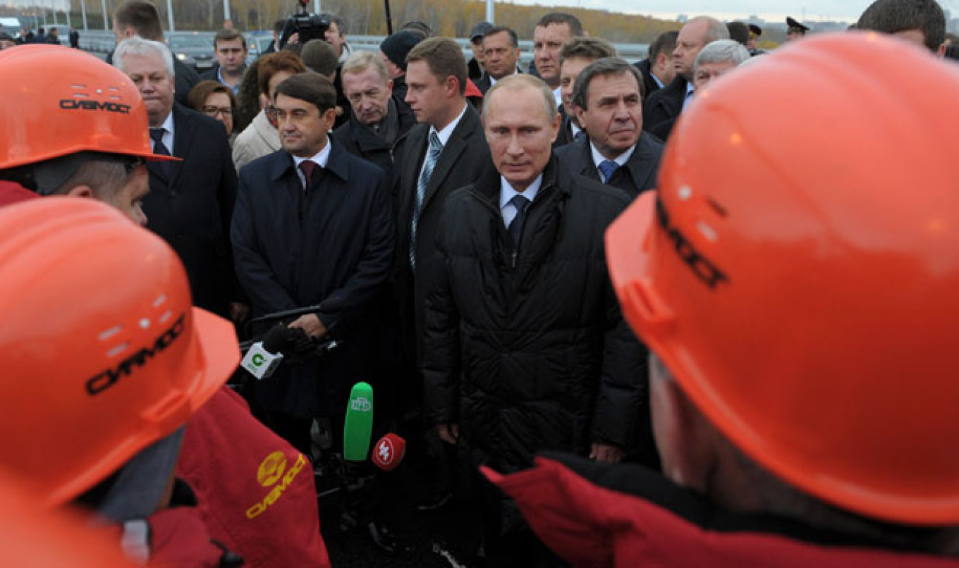 Despite Ruble's Fall, Russians Trust Putin to Prevent the Worst