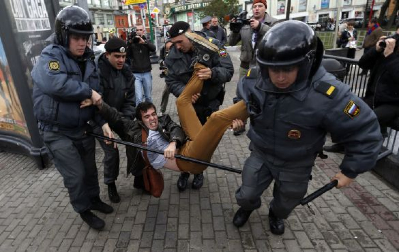 Putin's Birthday Marked With Praise and Protests