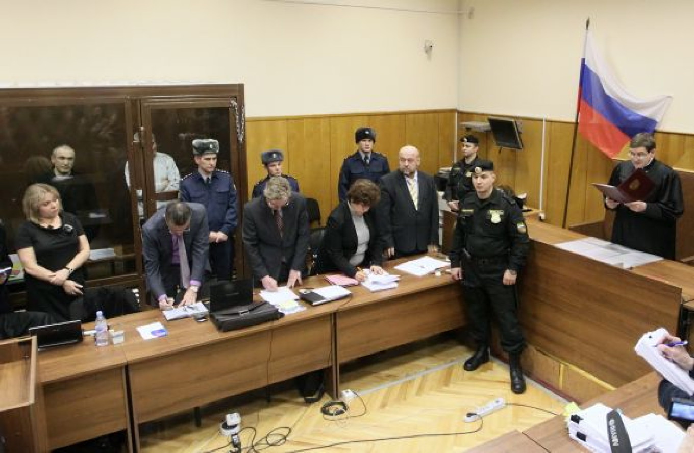 Assistant: Judge Was Pressured on Yukos