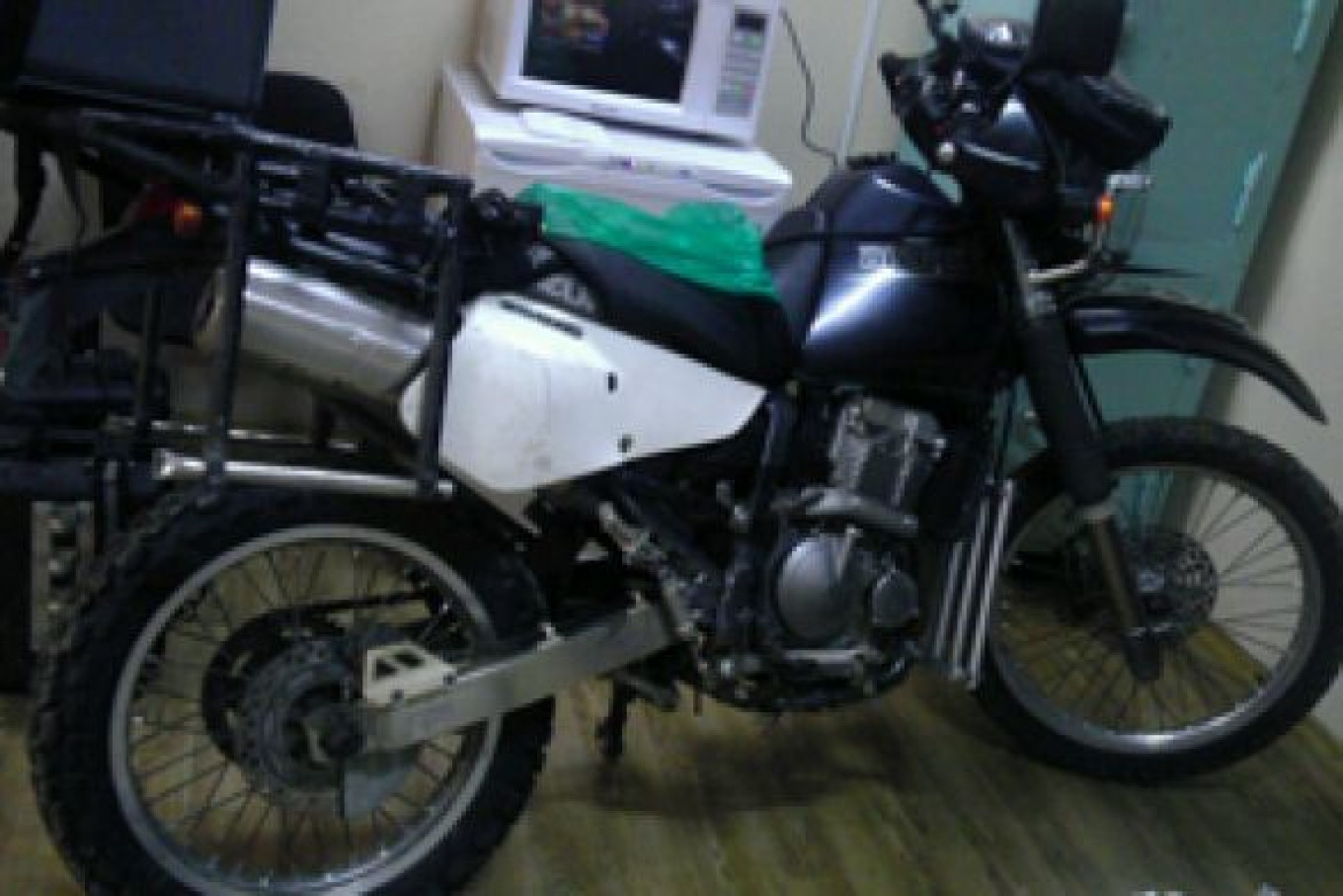 Police Arrest Young Men for Murder of Japanese Motorcyclist