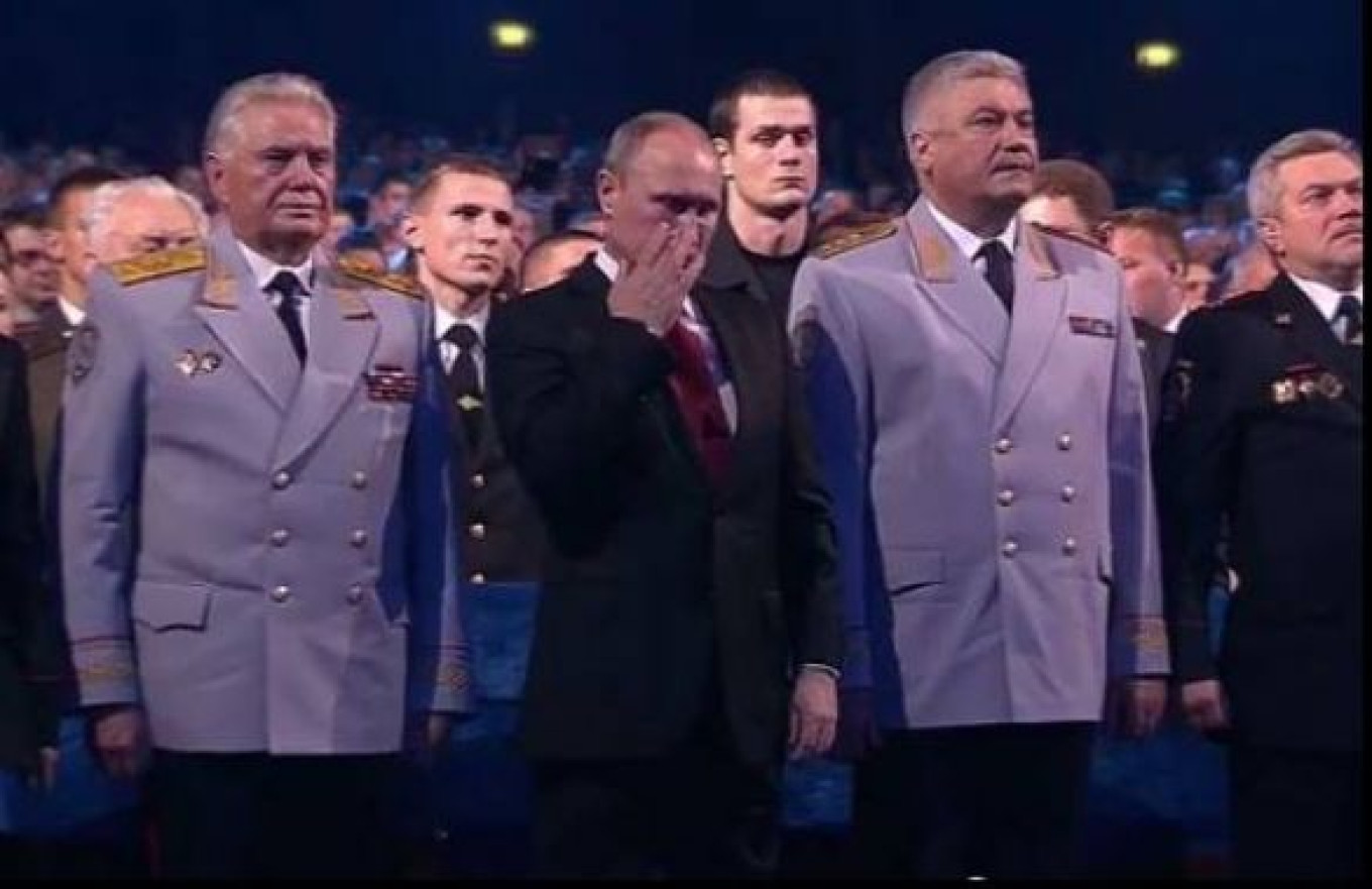 Putin Appears to Fight Back Tears at Police Day Concert (Video)