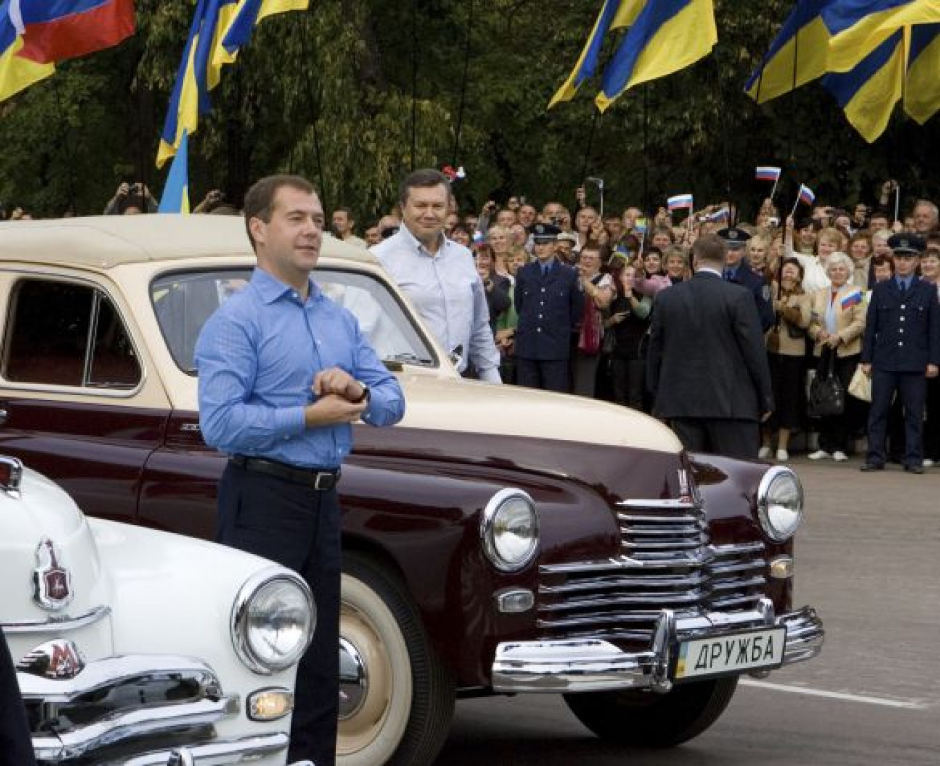 Medvedev Chases Putin in Vintage Sedan