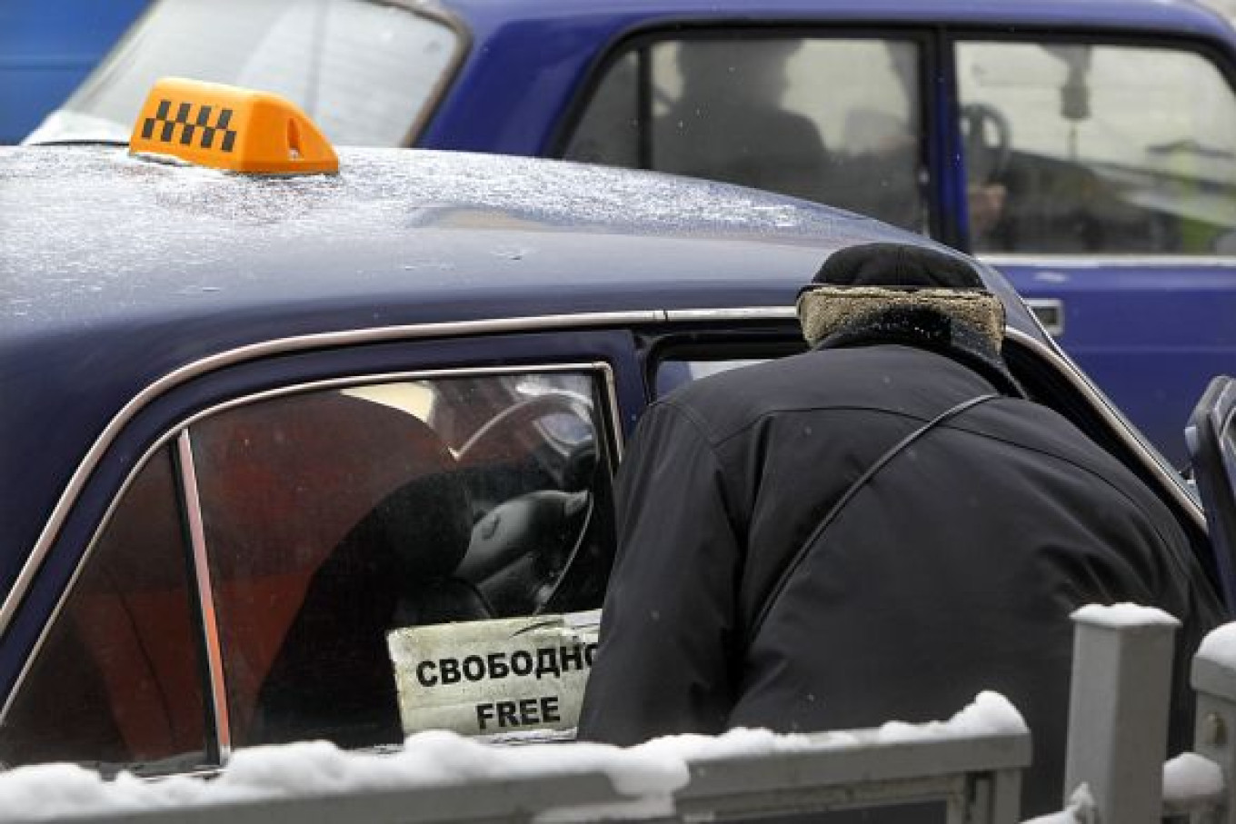 Days of One-Man Taxi Firms Are Numbered