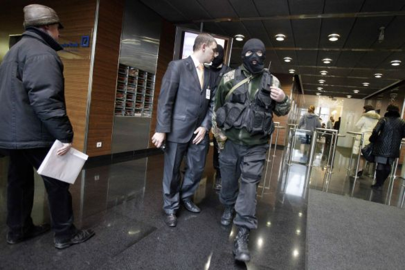 Masked Men Raid Deutsche Bank