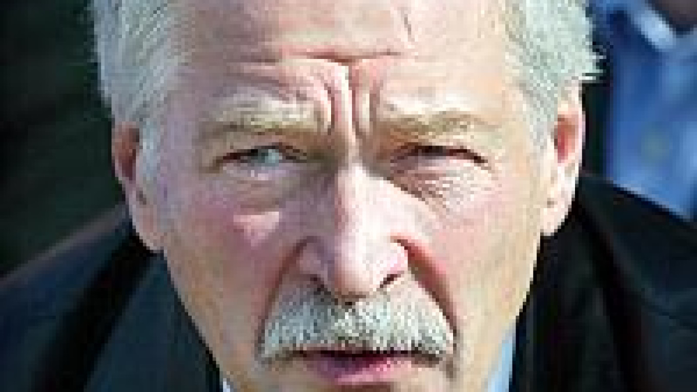 A Year On, Putin Reforms Still Divide