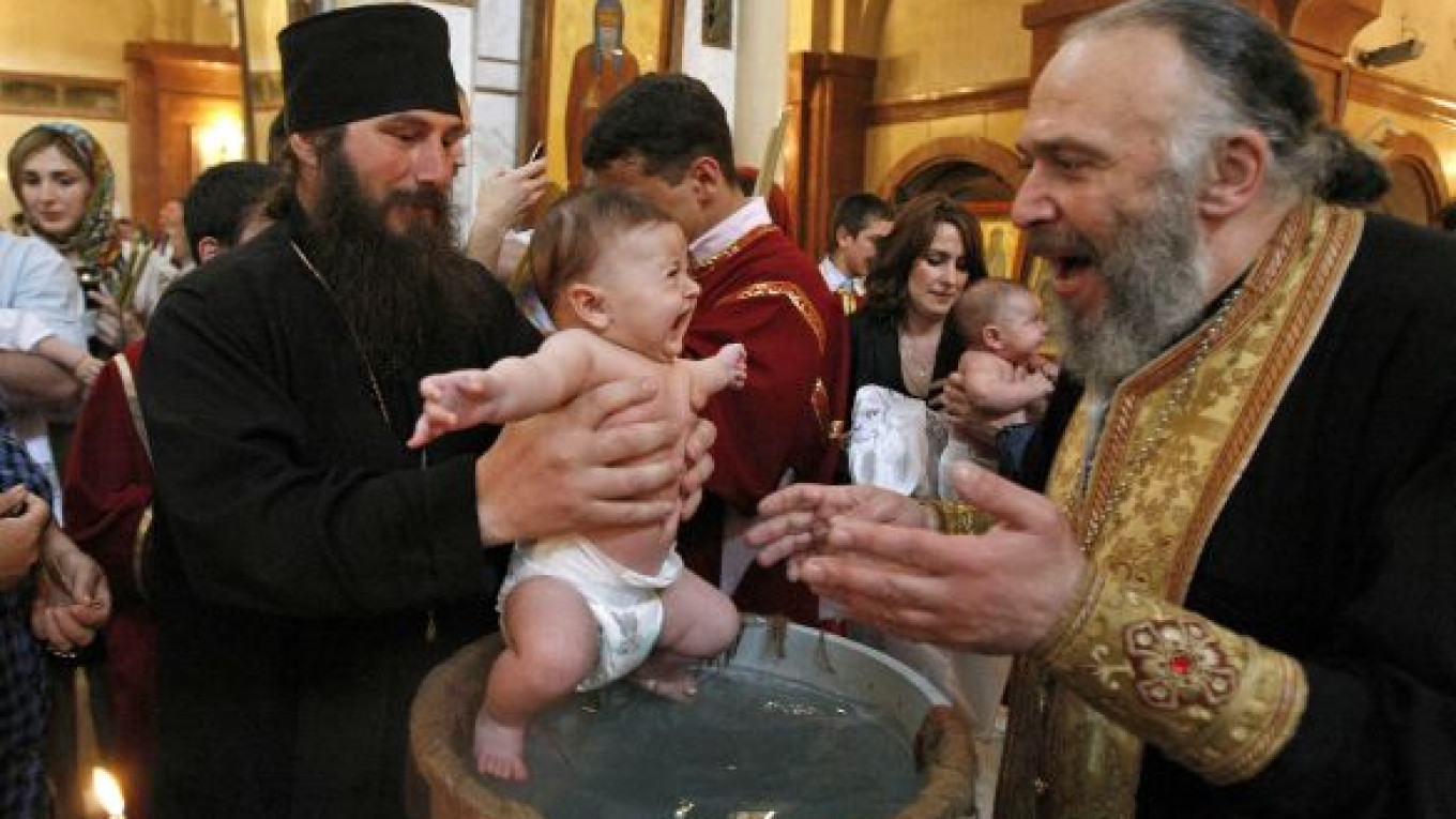 Georgia's Patriarch Baptizes 400 Babies